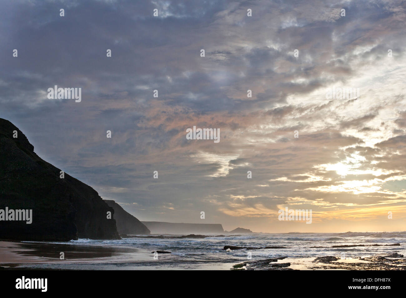 Sunset at Monet Clerigo beach in Portugal Stock Photo - Alamy