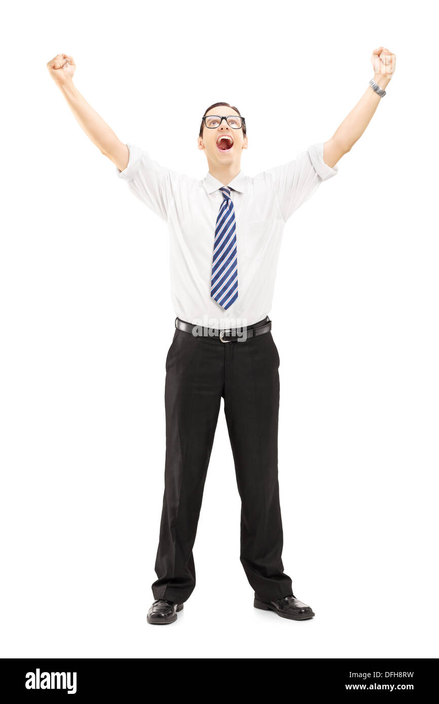 Full length portrait of an excited male with raised hands gesturing ...
