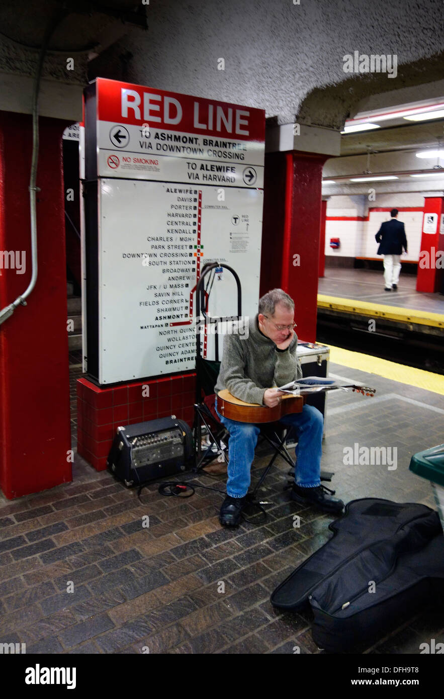 Commuter reading newspaper waiting subway hi-res stock photography and ...