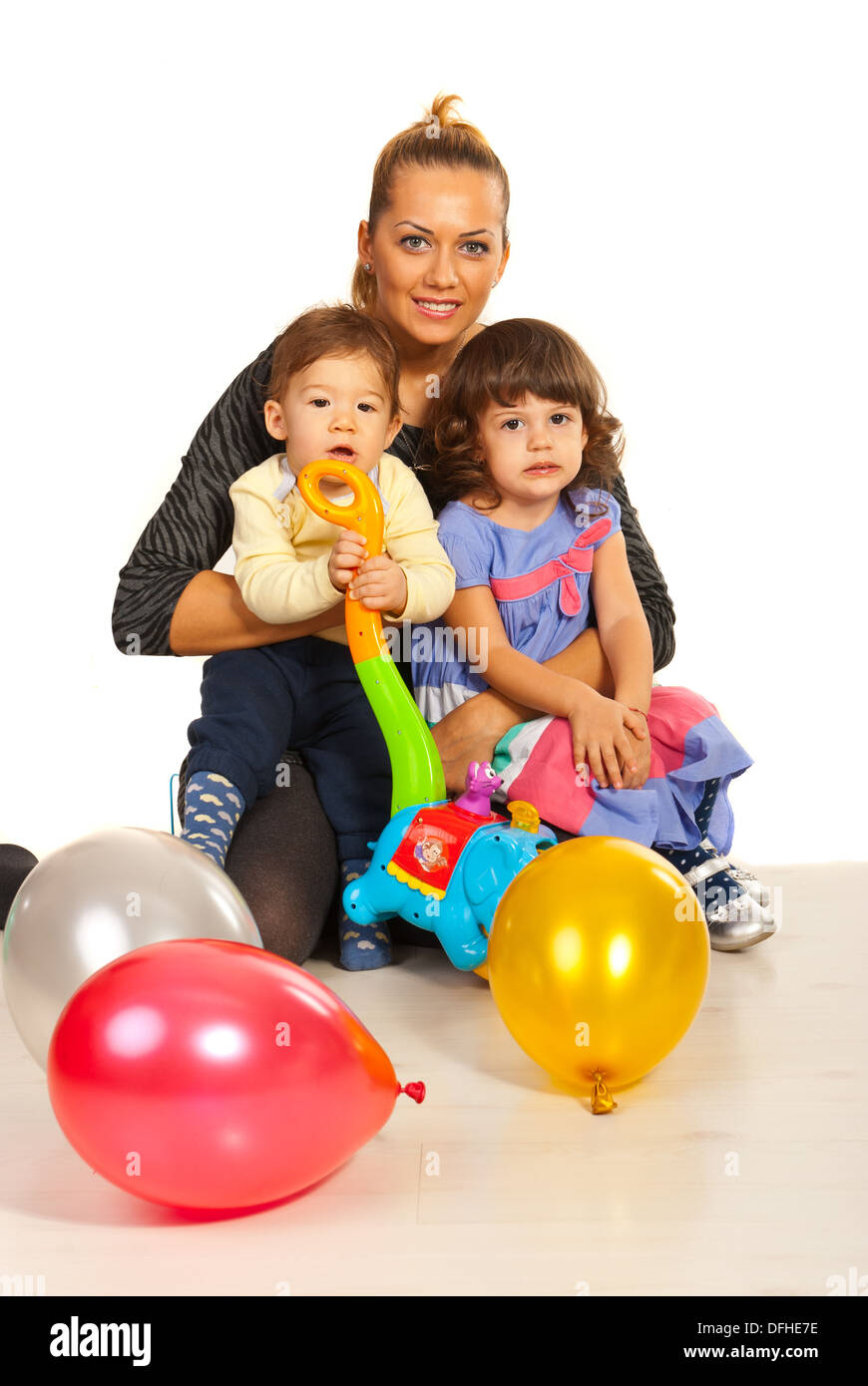 Happy mother embracing her kids against white background Stock Photo ...