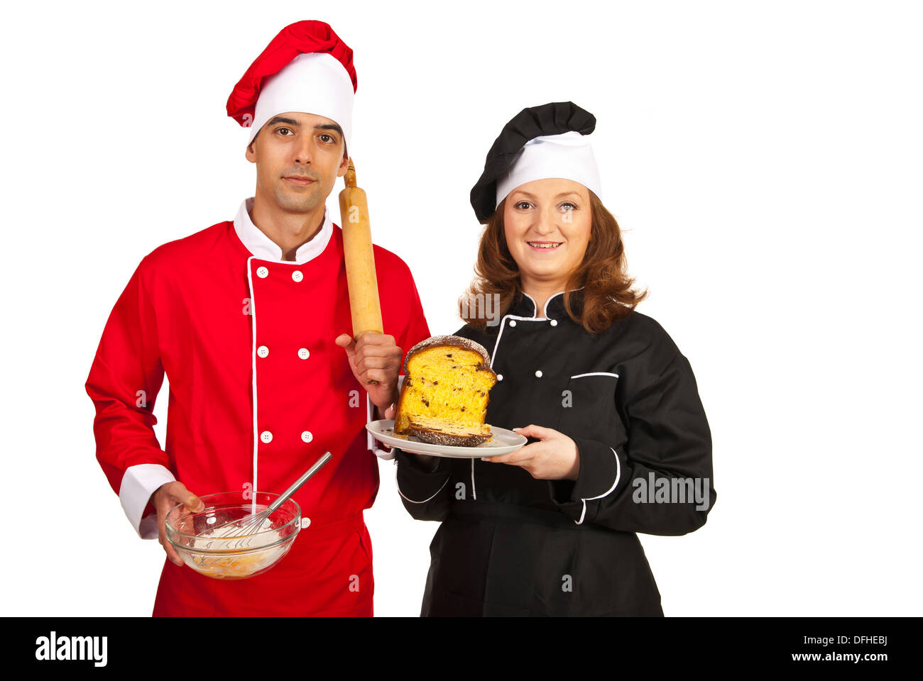 Team of bakers in uniform showing dough,rolling pin and sponge cake ...