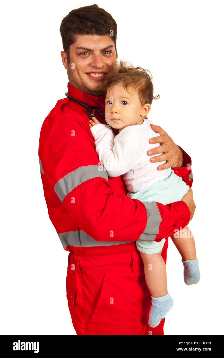 Smiling paramedic man holding baby boy isolated on white background ...