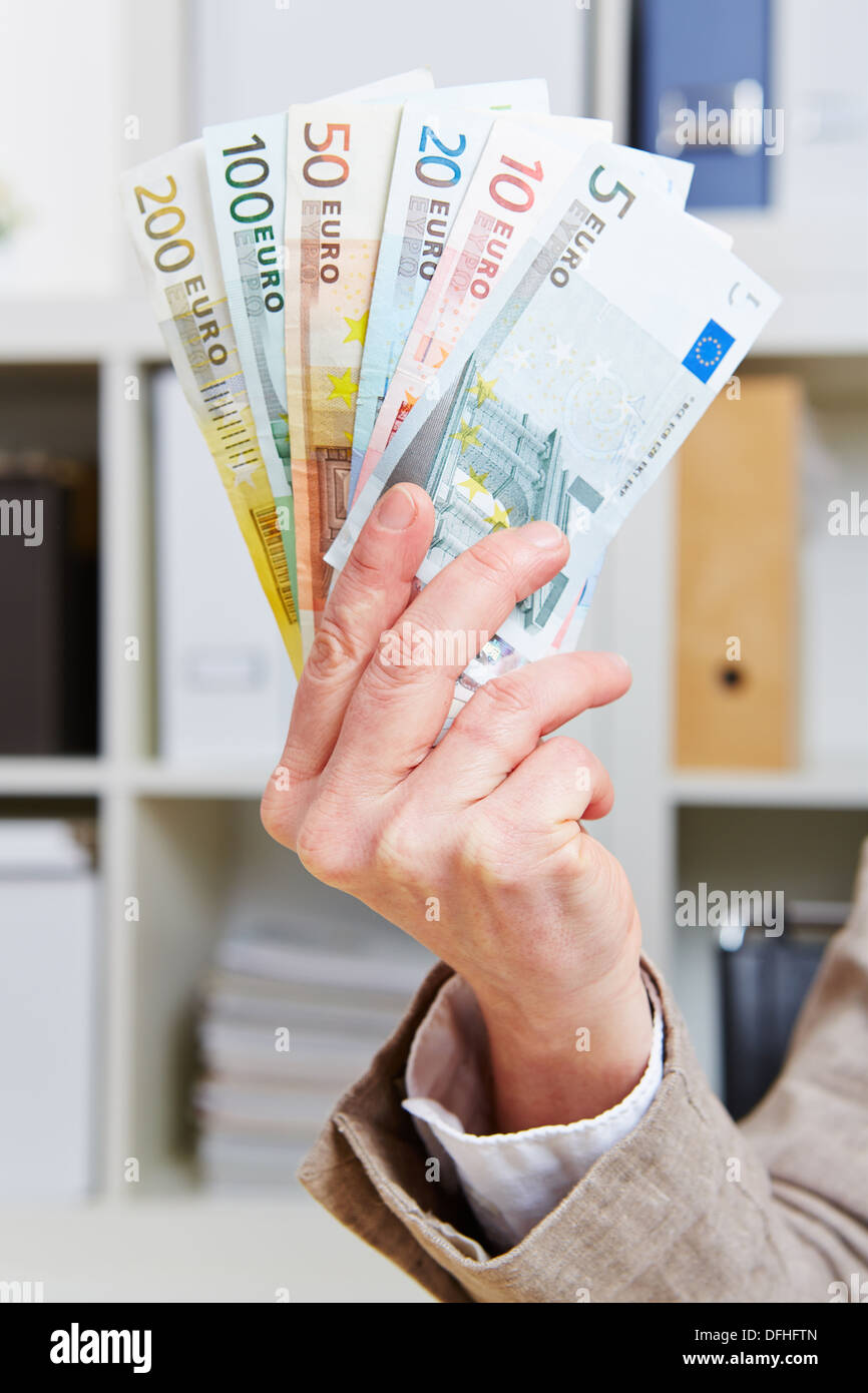 Hand money euro hi-res stock photography and images - Alamy
