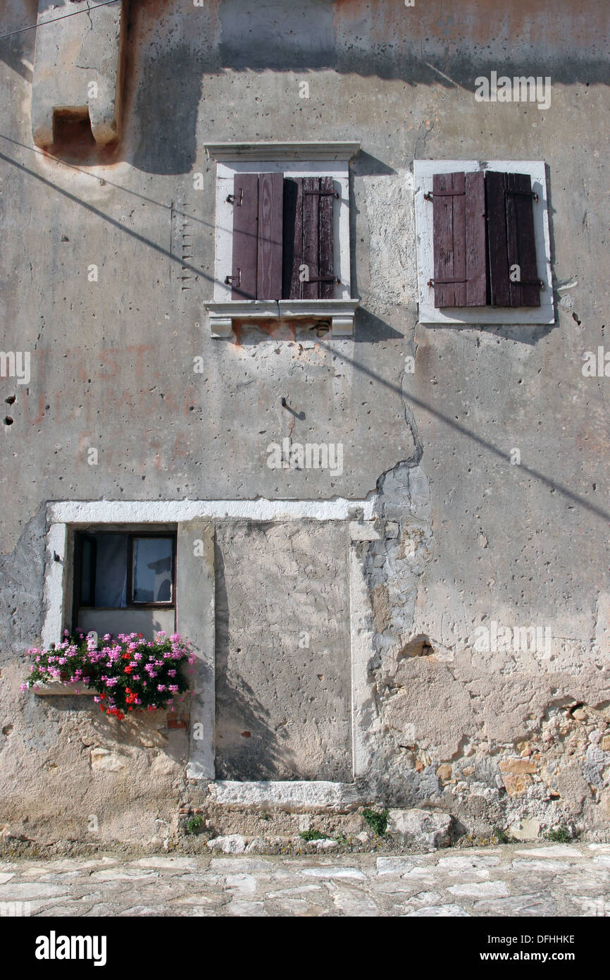 Old house with flowers Stock Photo - Alamy