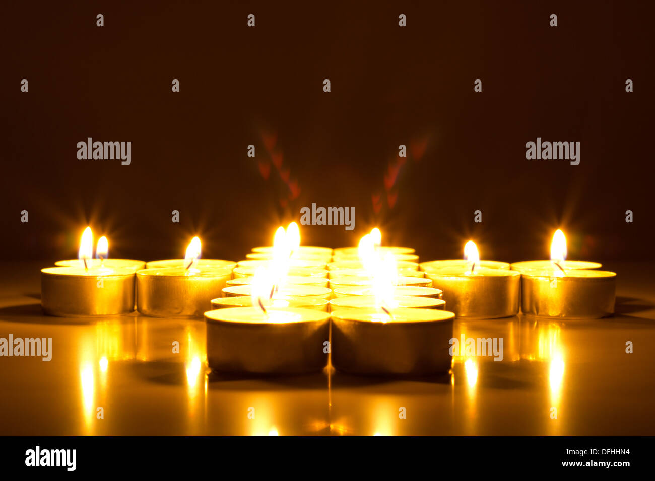 Candles with lens flares in shape of little hearts Stock Photo - Alamy