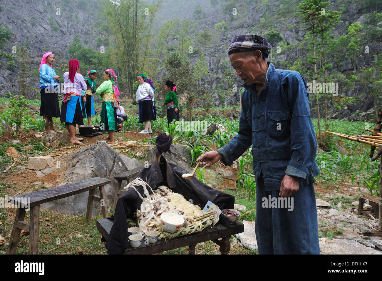 Shaman doing rituals above altar in memory of deceased,funeral in a ...