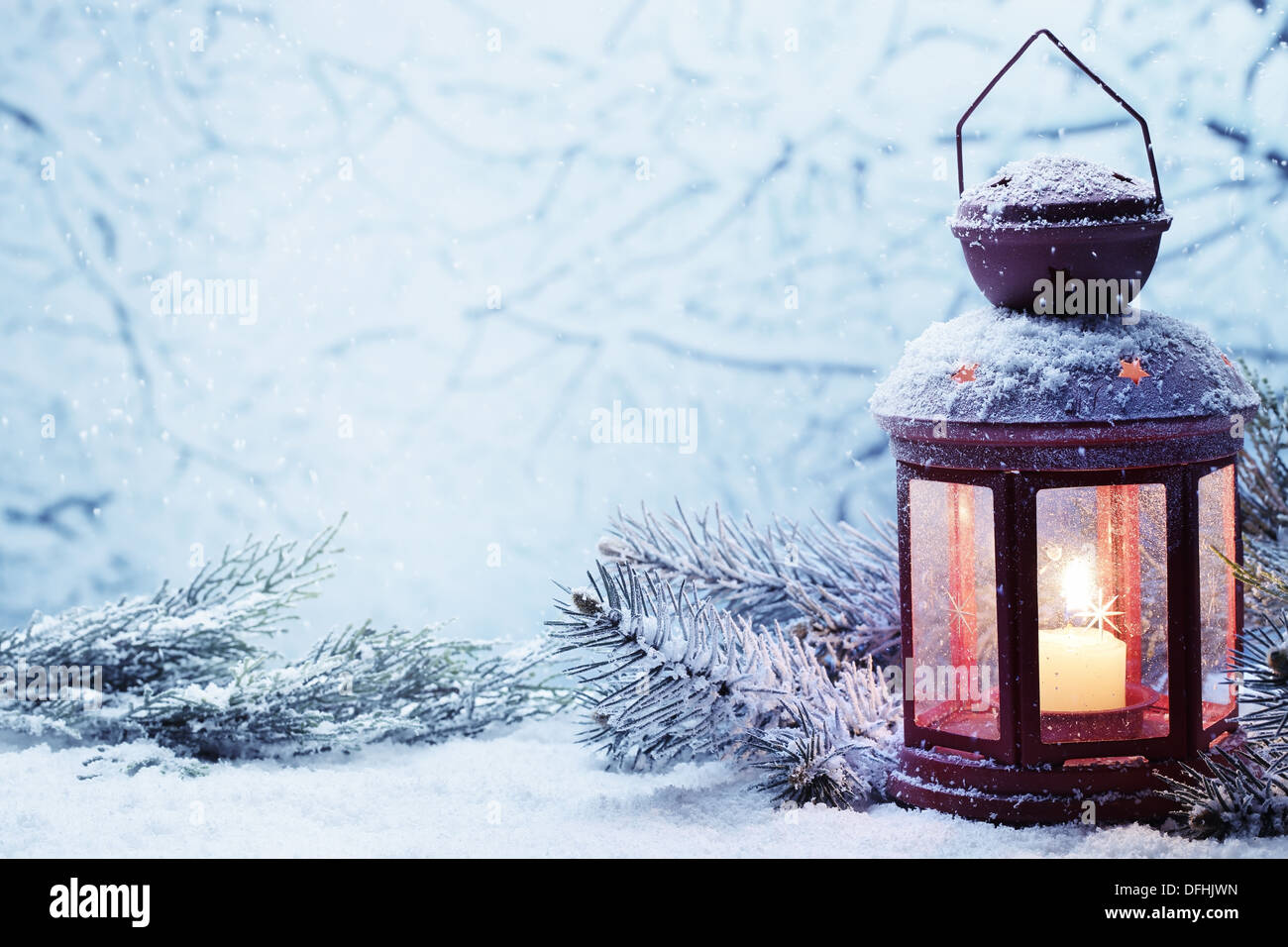 Christmas lantern with snowfall,Closeup Stock Photo - Alamy