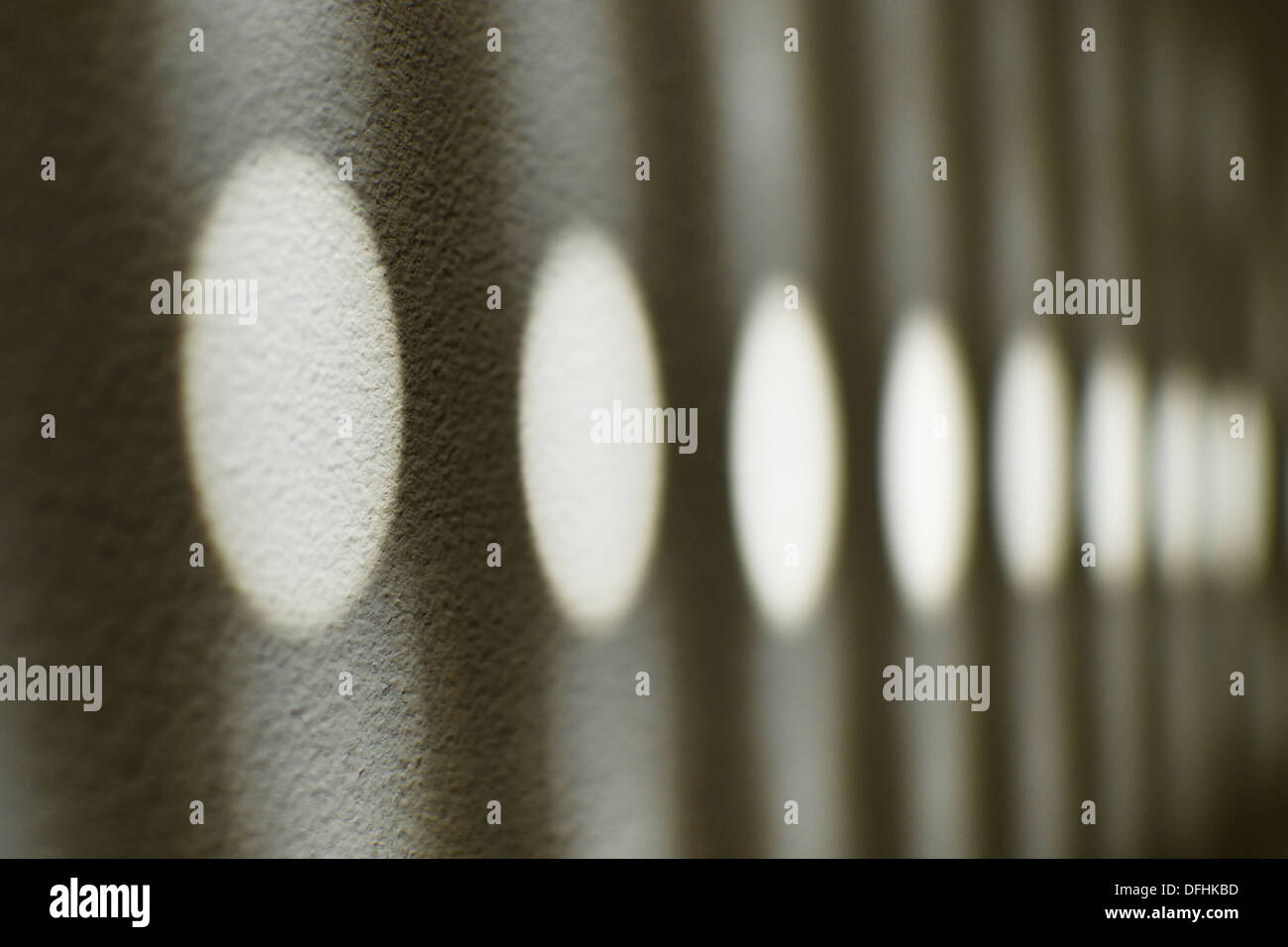 white lights on the wall, symmetrical forms Stock Photo - Alamy