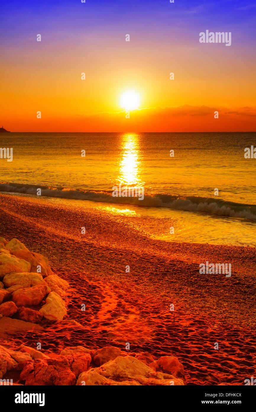 Sunset over the ocean Stock Photo - Alamy