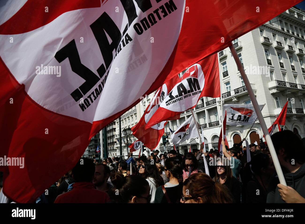 Athens, Greece. 05th Oct, 2013. Protesters fly PAME flags during the ...