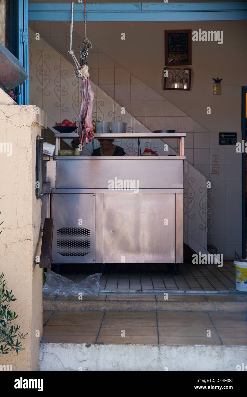 Restaurant with hanging skinned rabbits in Panormos, Crete, Greece ...
