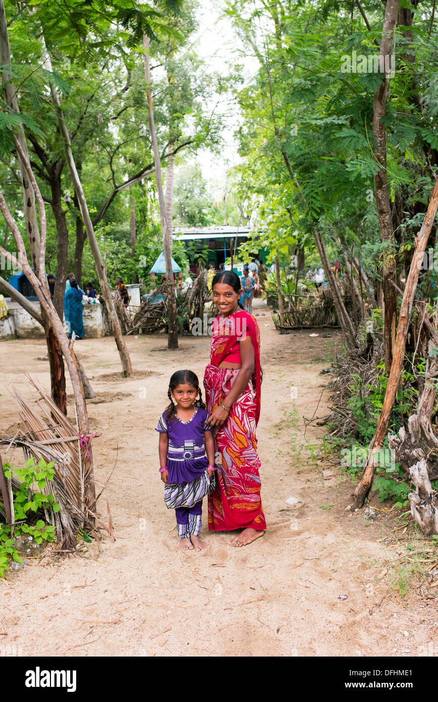 Indian woman and child going to the Sri Sathya Sai Baba mobile outreach ...
