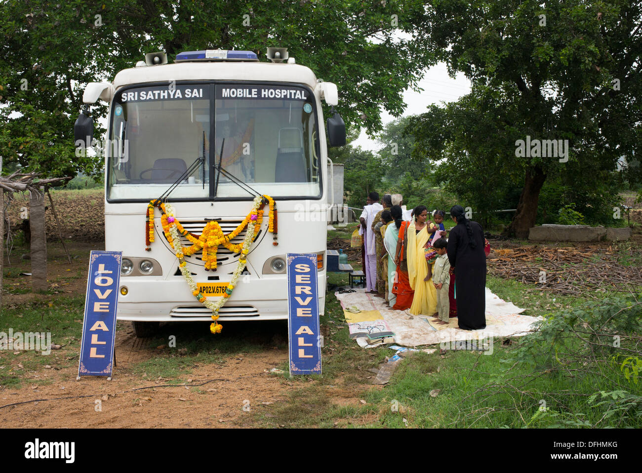 Patients queuing for testing in the Sri Sathya Sai Baba mobile hospital ...