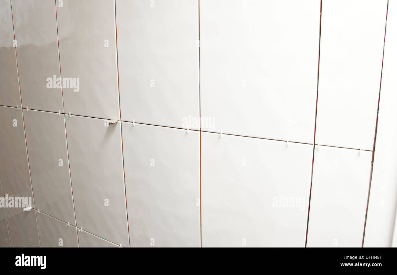 Tiles in a wet room / shower / bathroom on a newly plastered wall Stock ...