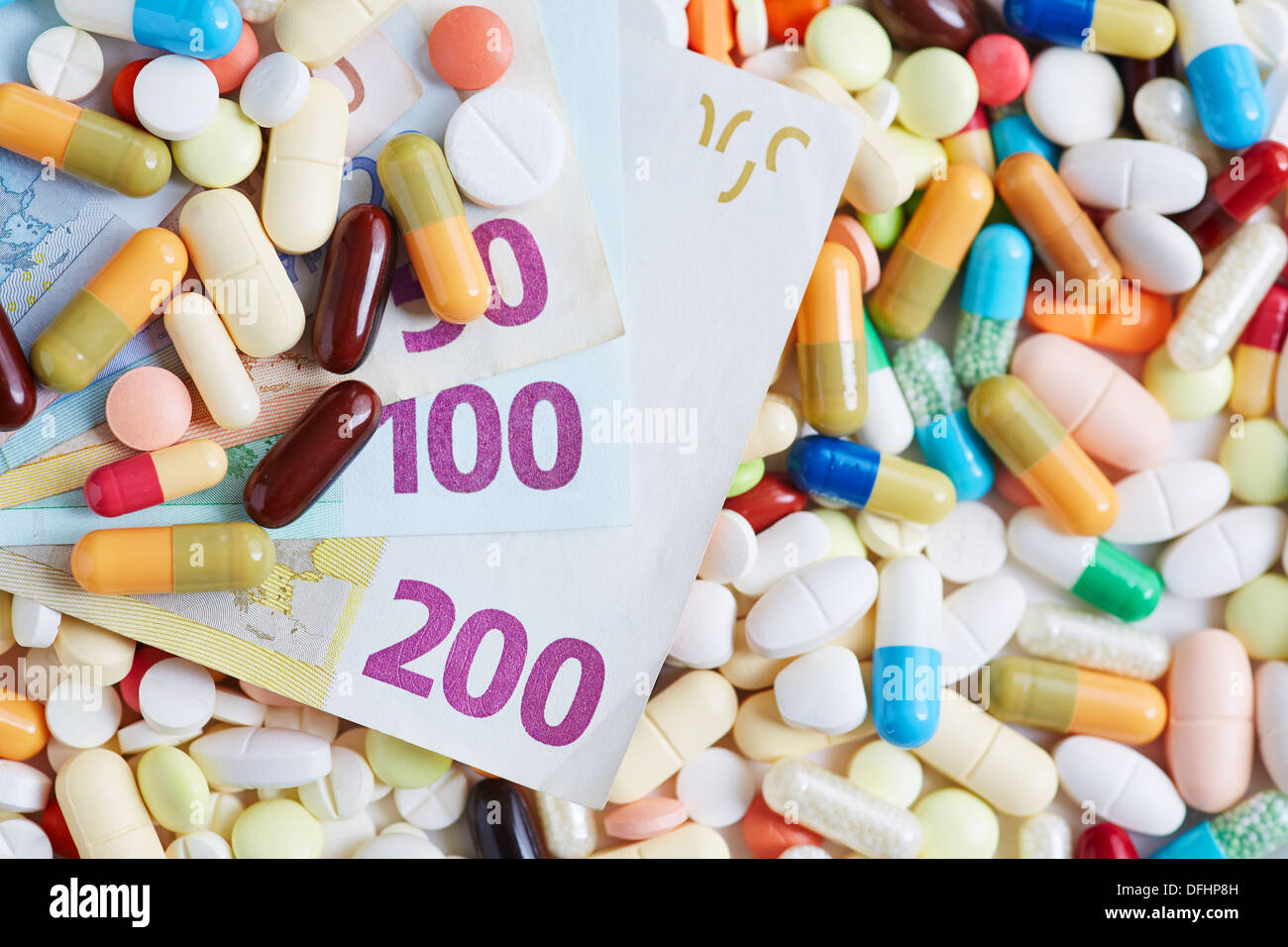 Euro money bills laying on many pills and tablets Stock Photo - Alamy