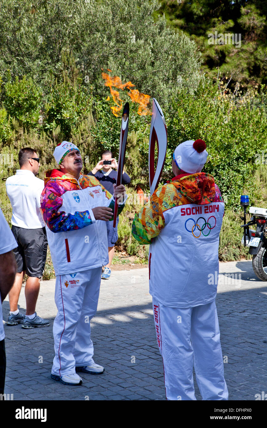 Athens, Greece. 05th Oct, 2013. Runner with Olympic Flame going past ...