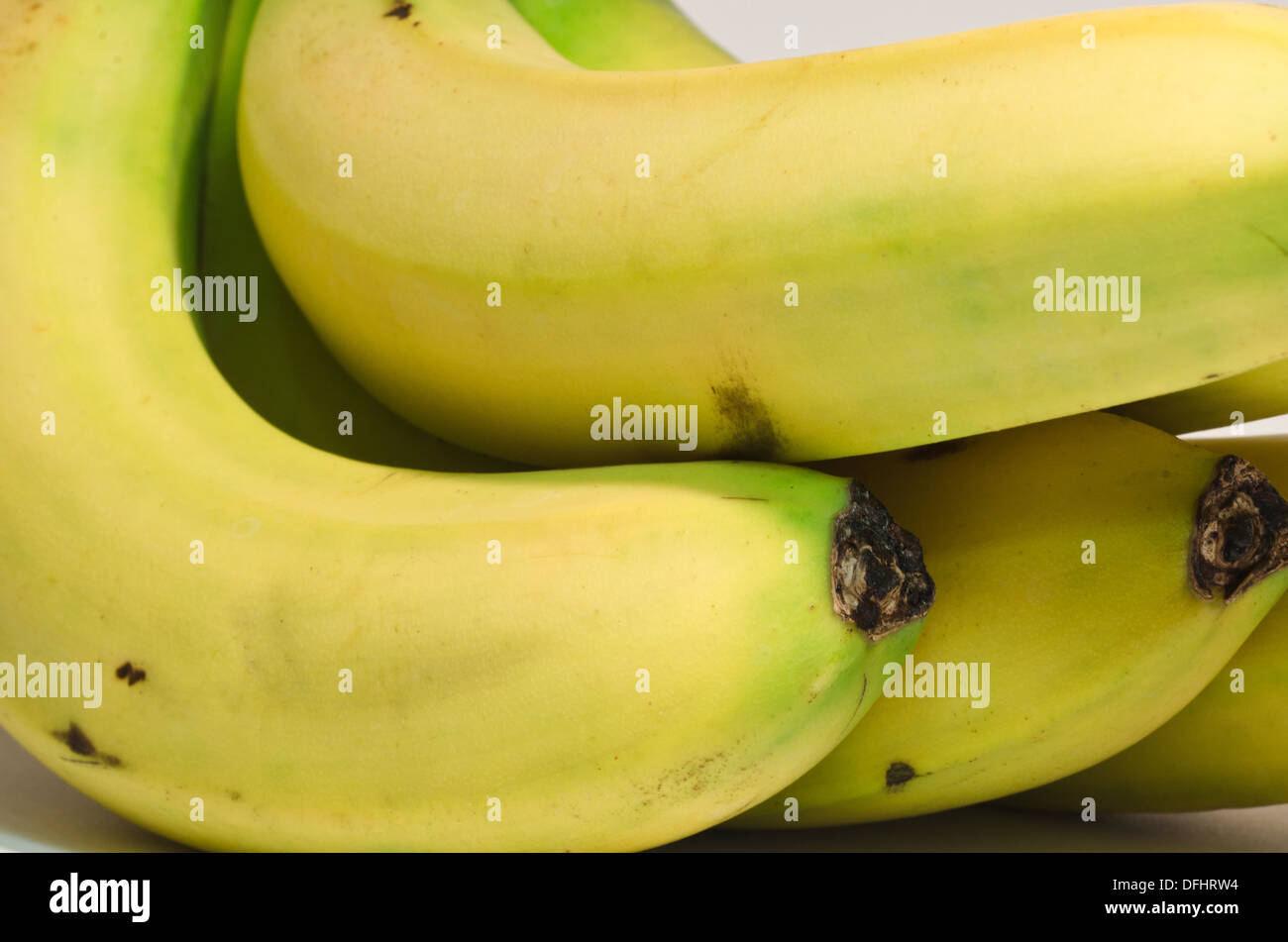 A bunch of organic and yellow bananas Stock Photo - Alamy
