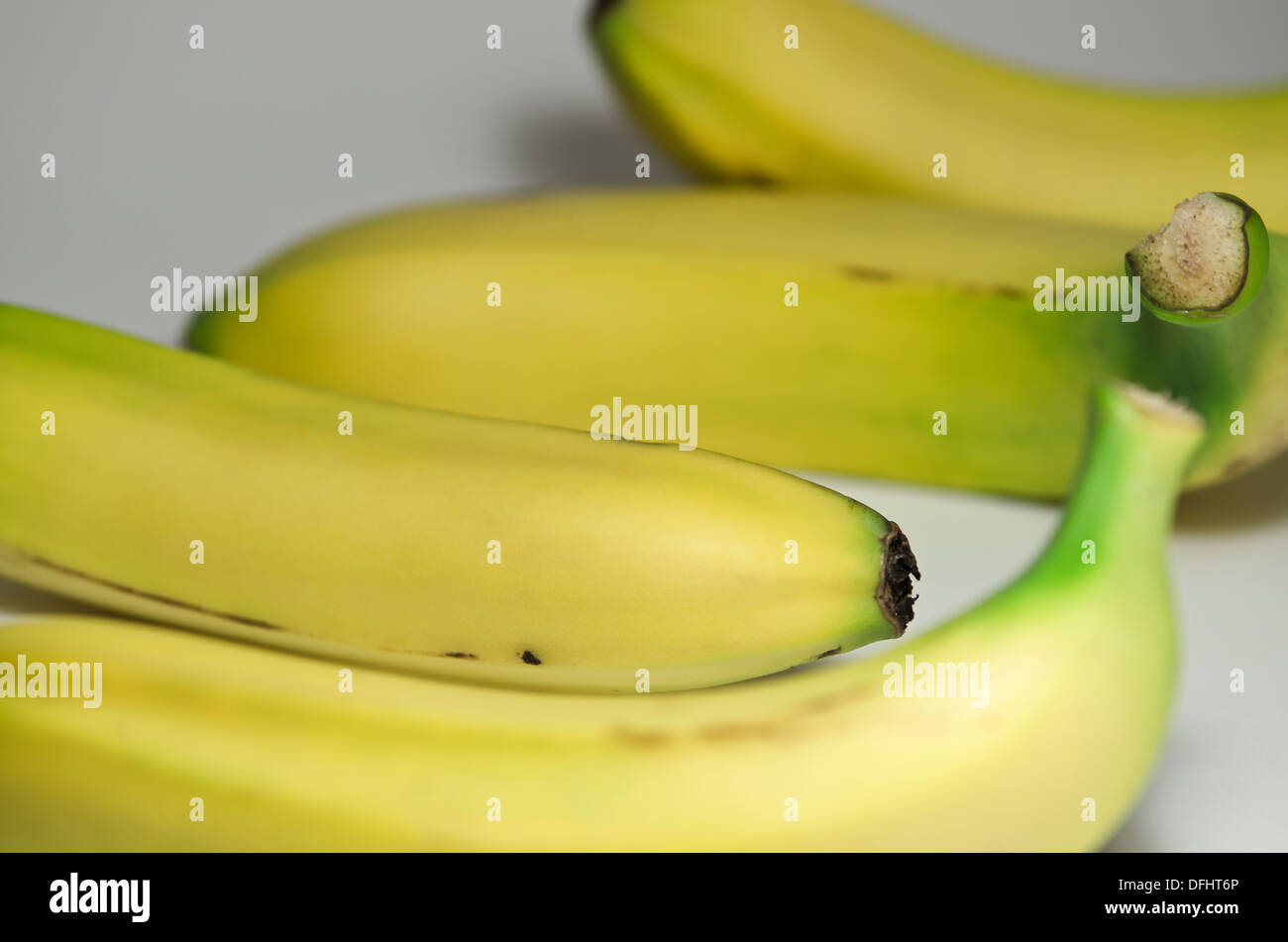 A bunch of organic and yellow bananas Stock Photo - Alamy