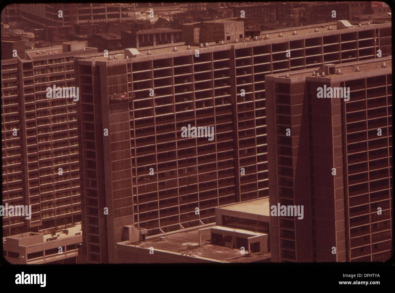 High-rise apartment buildings are seen in an urban setting. These ...