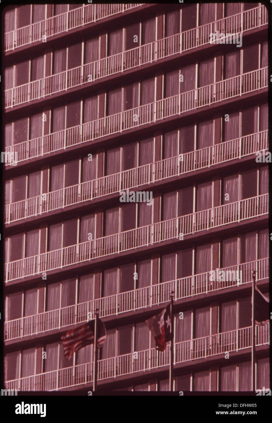 A high-rise apartment building, characterized by its tall structure and ...