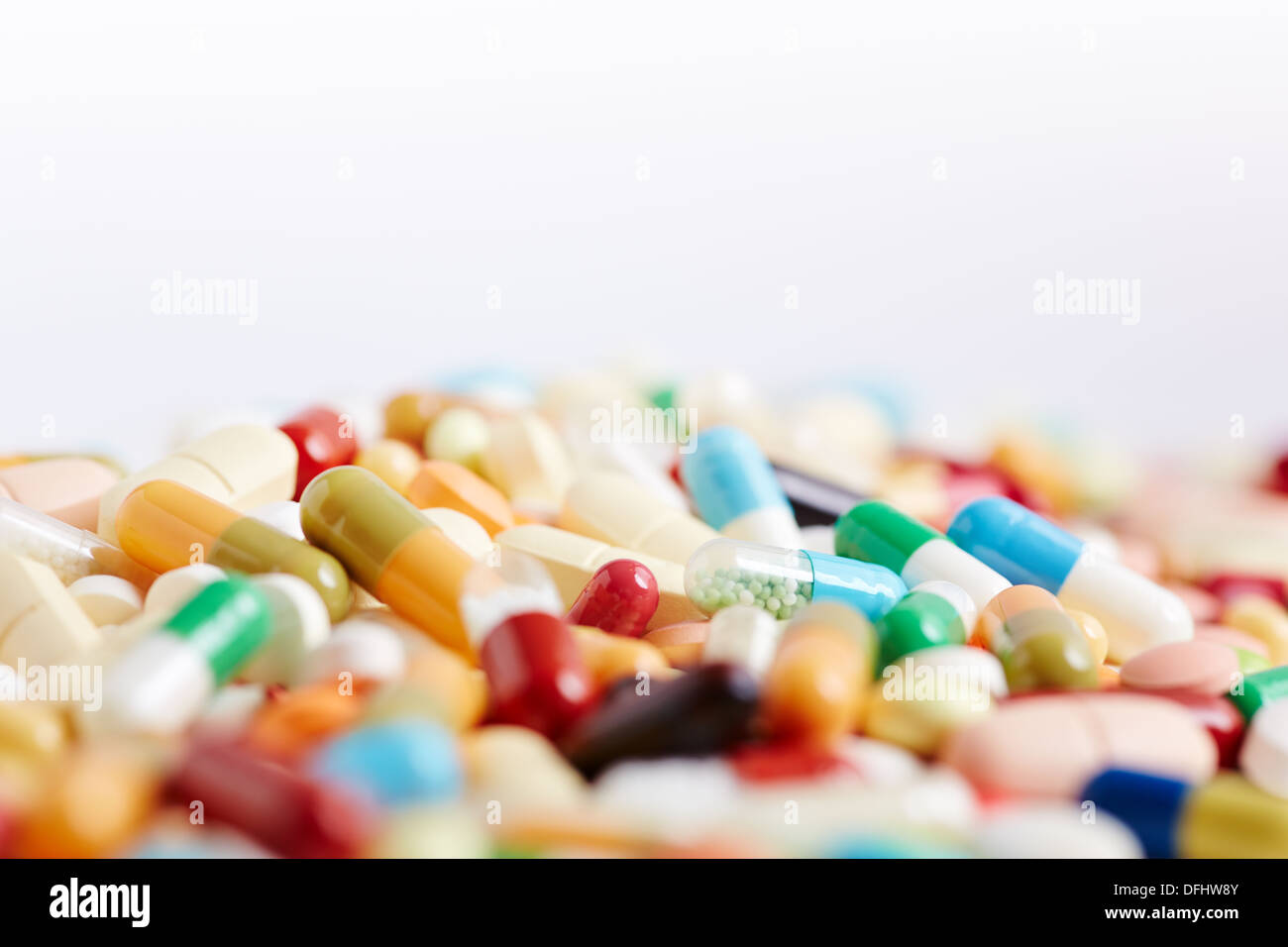 Colorful medication medicine background with pills and capsules Stock ...