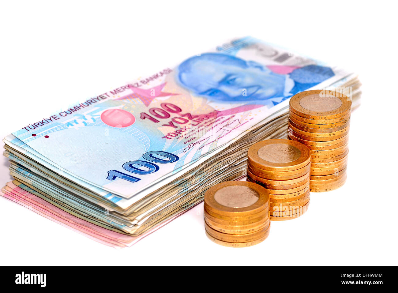 Turkish paper money and coins tower on white background Stock Photo - Alamy