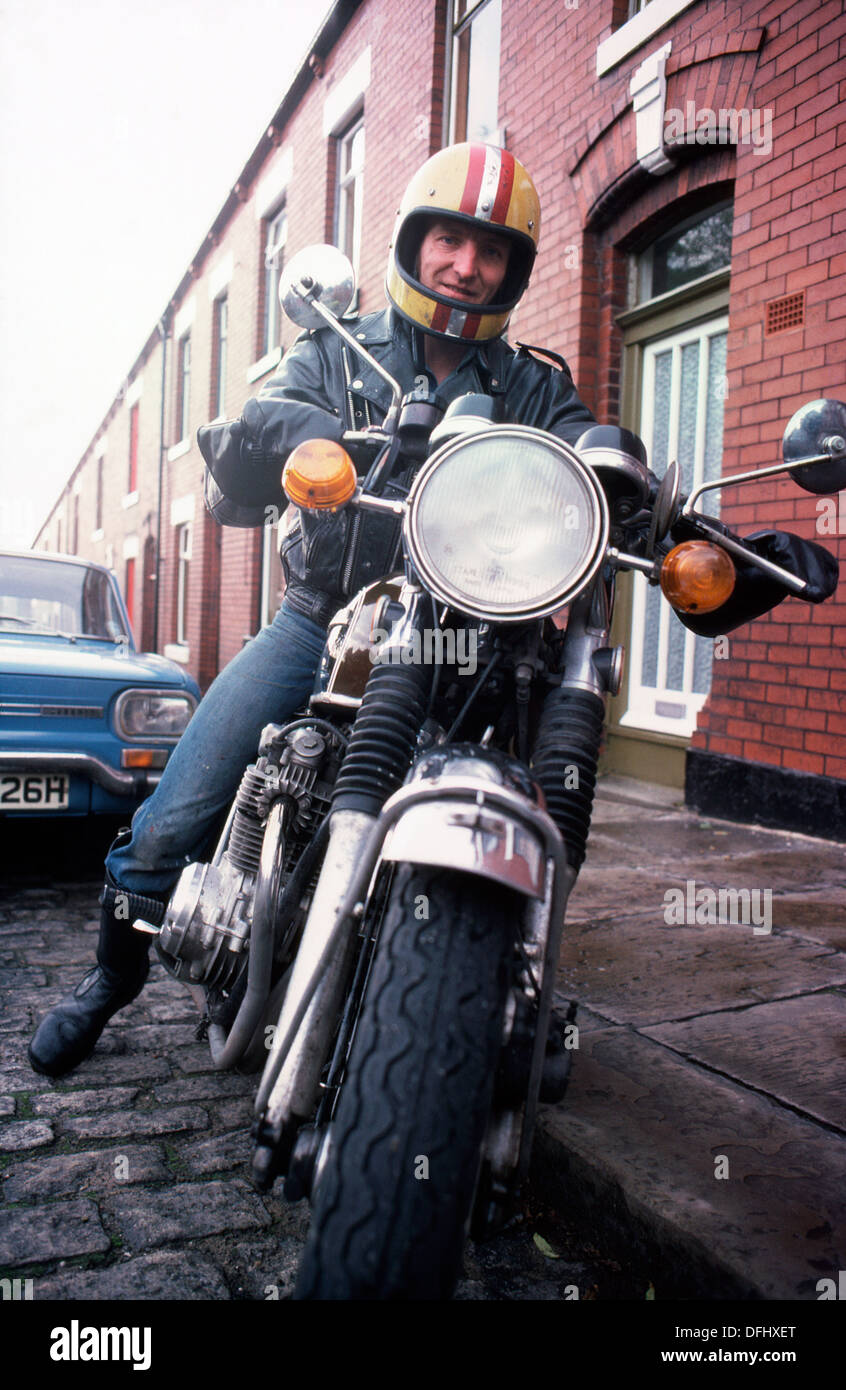 Lancashire street artist Walter Kershaw on his Honda motorcycle ...