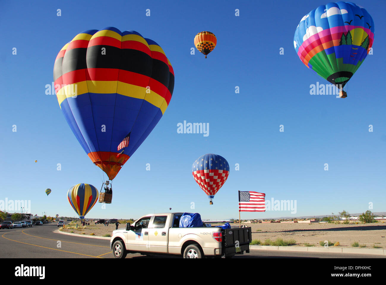 Albuquerque, New Mexico, USA. 05th Oct, 2013. Hot air balloons touch ...