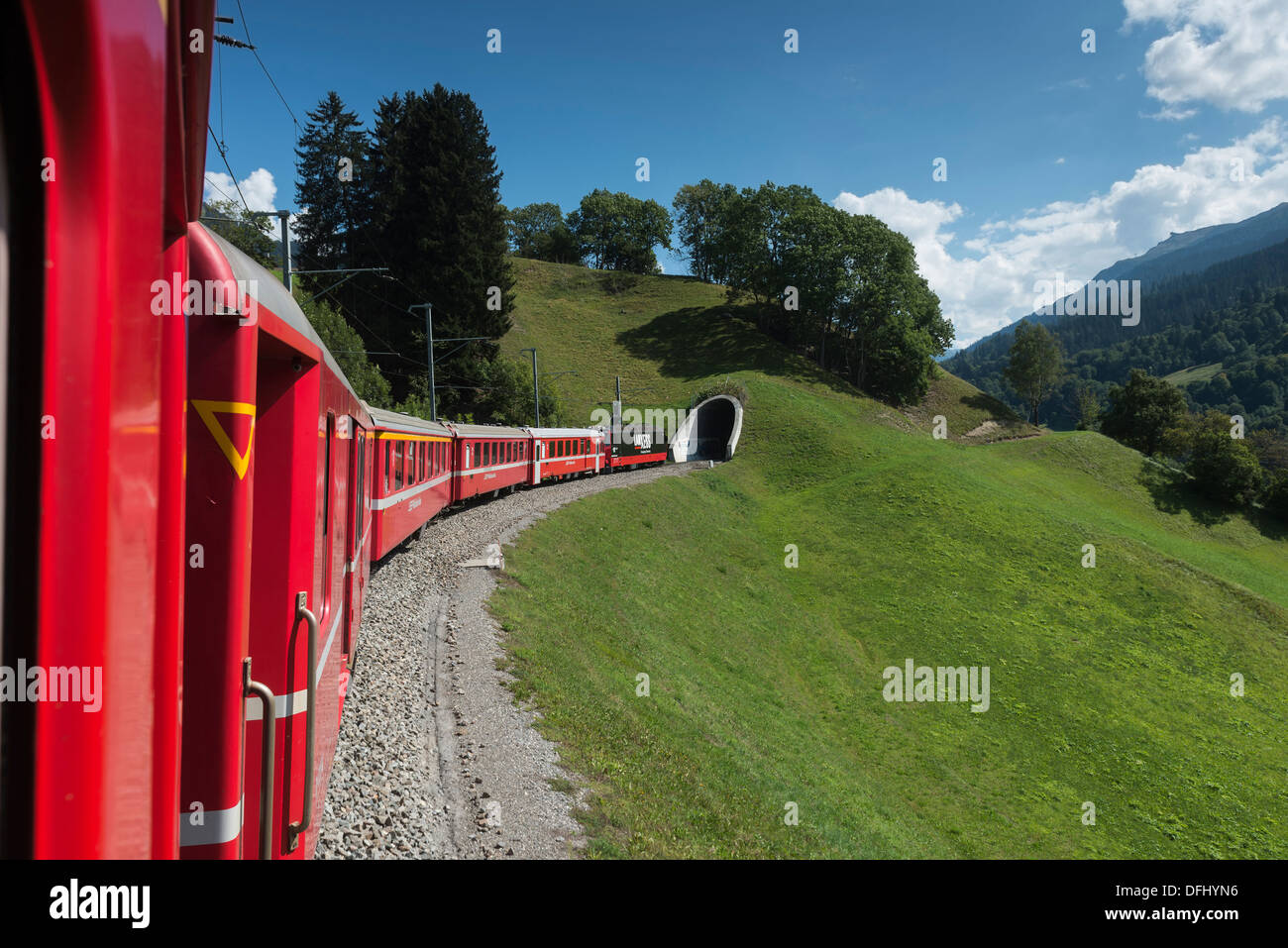 Rhaetian railway rhb approaching tunnel hi-res stock photography and ...