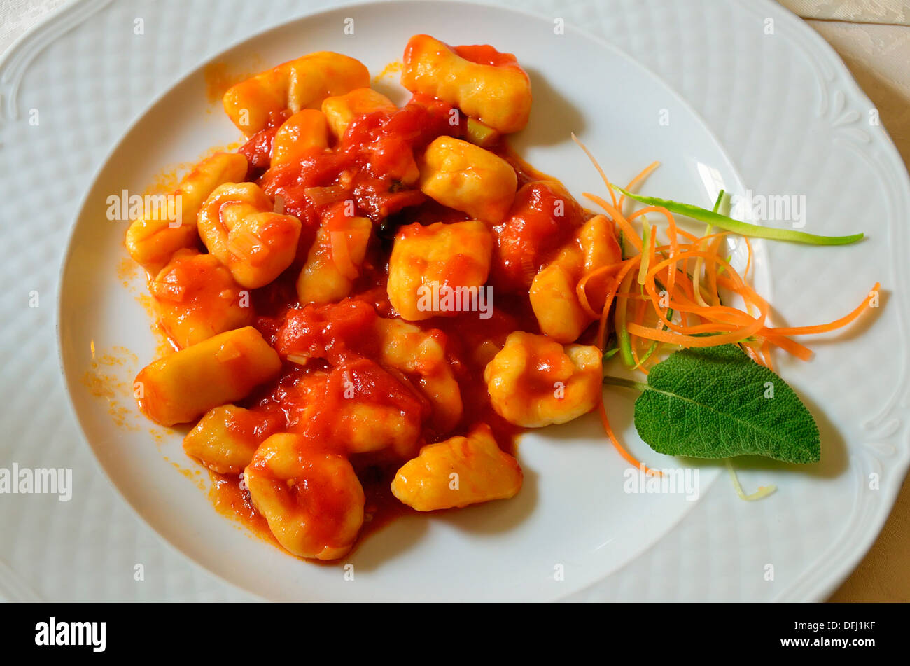 A plate of freshly made gnocchi at a restaurant in Tuscany, Italy Stock ...