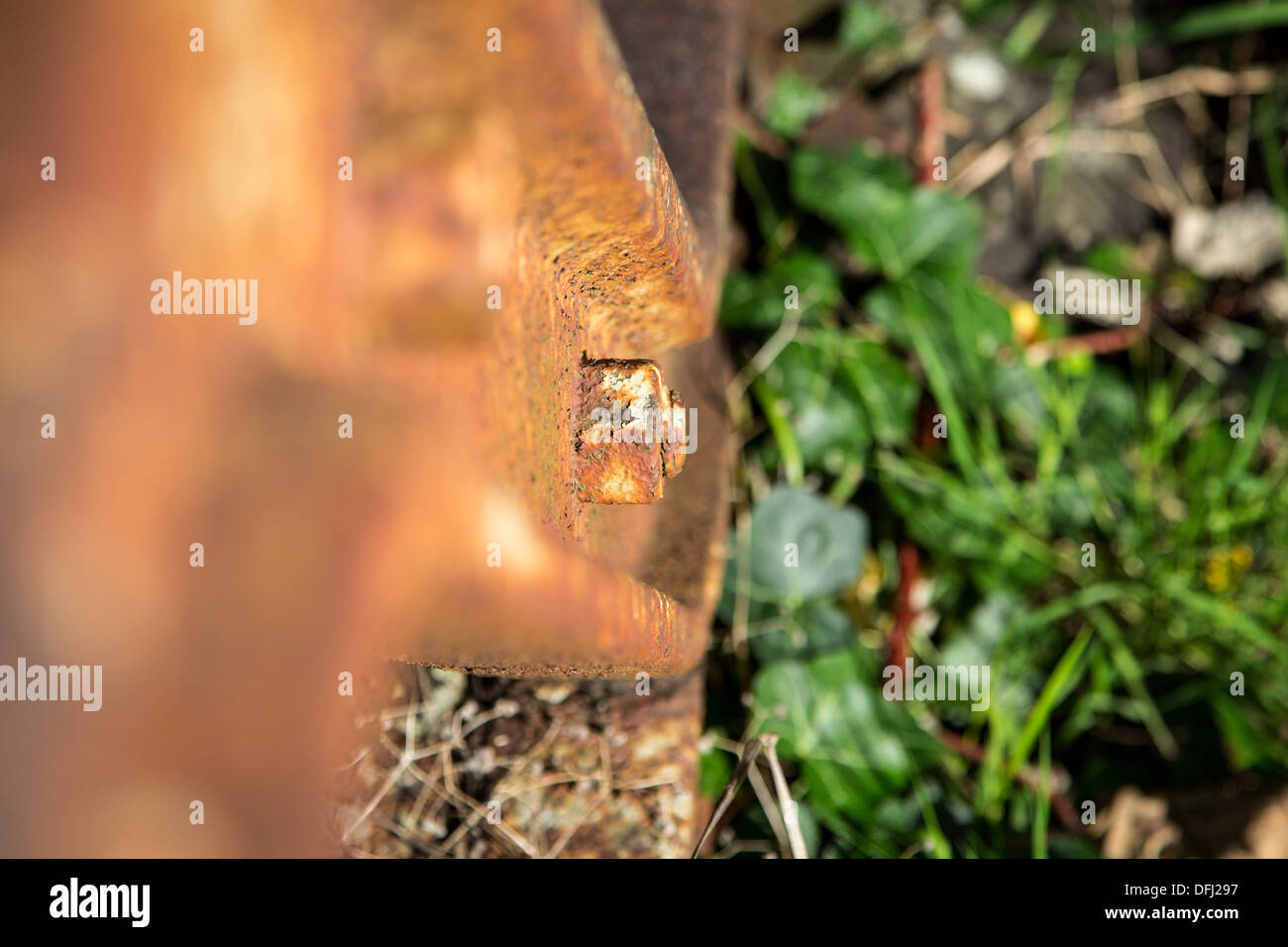 Rusty train track bolt Stock Photo - Alamy