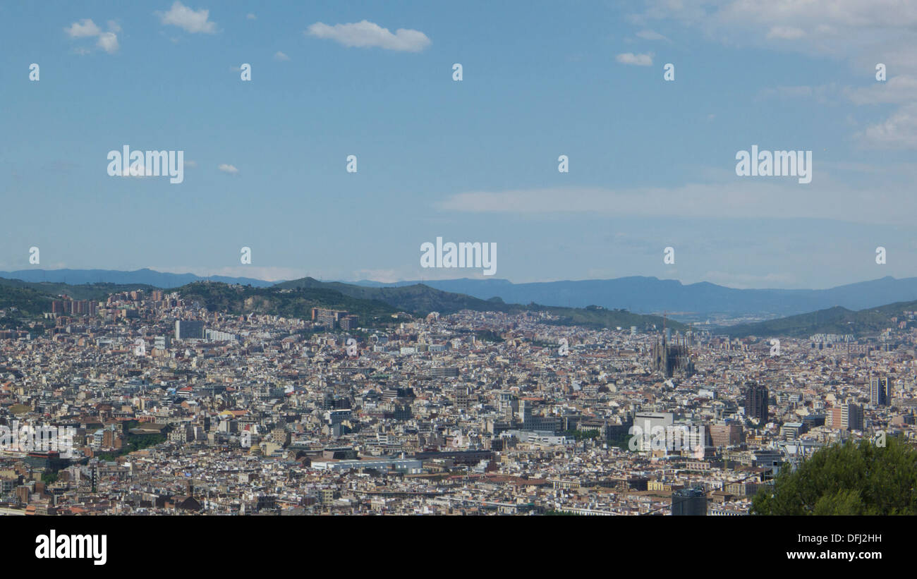 High angle distant cityscape and blue sky, Barcelona, Spain Stock Photo ...