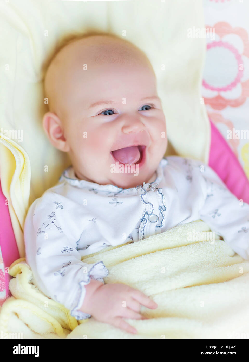 Closeup portrait of pretty newborn baby laughing, little child lying ...