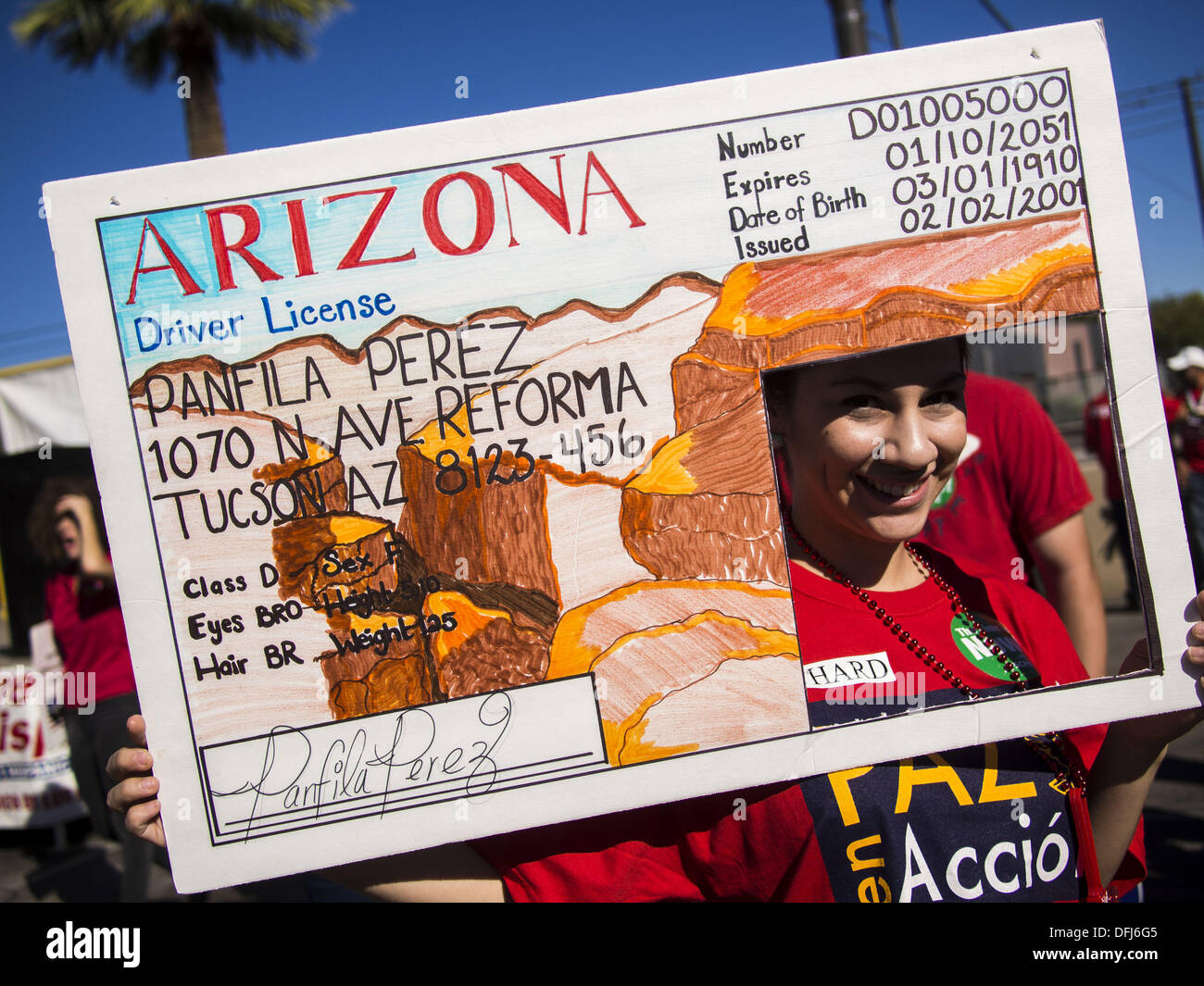 Phoenix, Arizona, USA. 5th Oct, 2013. A woman supporting immigration ...