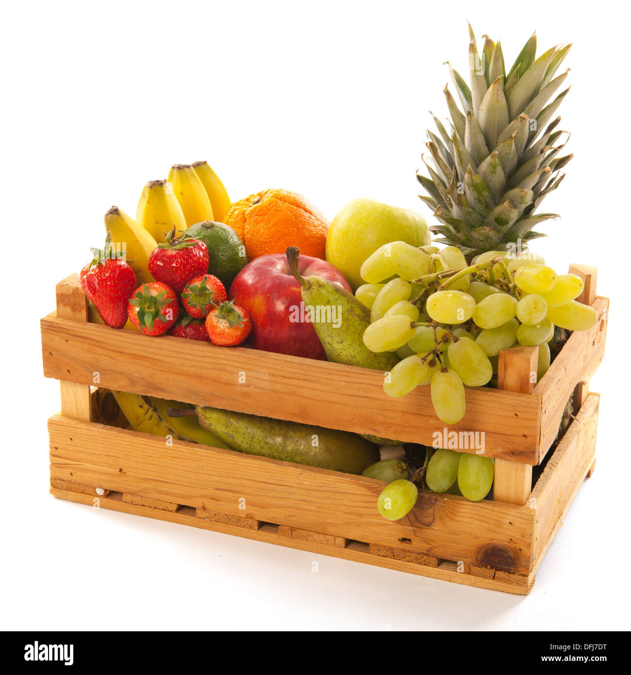 Wooden crate with fresh fruit isolated over white background Stock ...