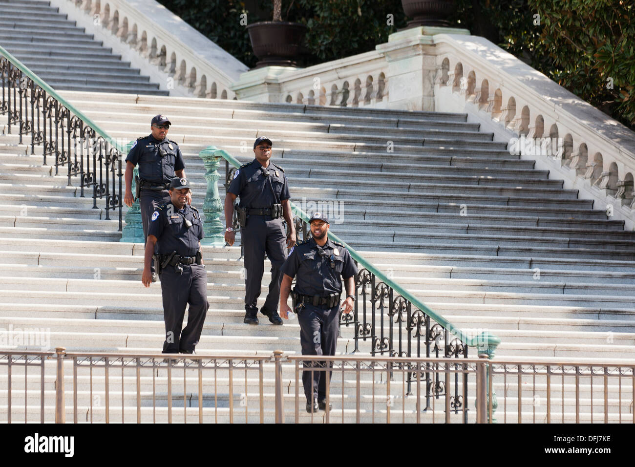 US Capitol Police officers walking down steps of the Capitol building ...