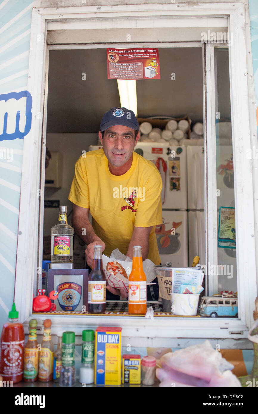Richard Messier serves a lobster roll on his High Tide Lobster Food ...