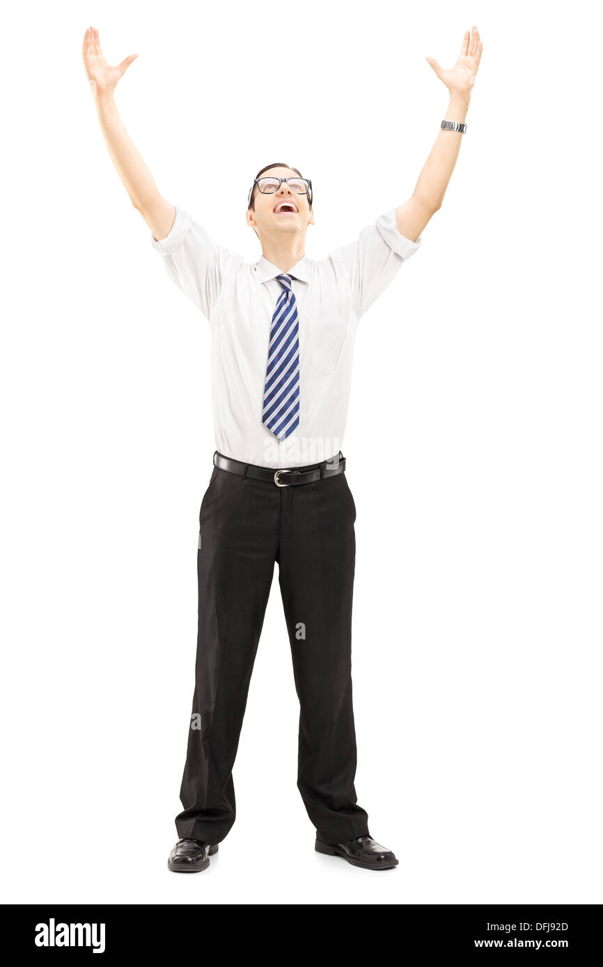 Full length portrait of an excited young man with raised hands Stock ...