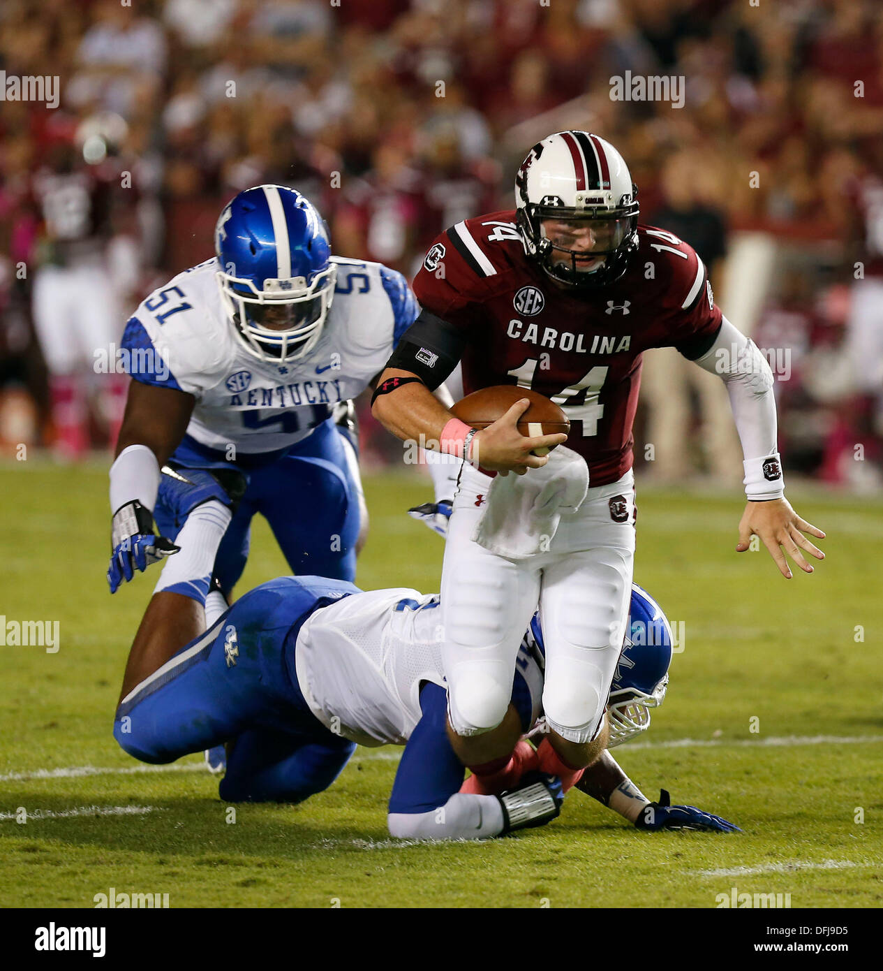 Columbia, SC, USA. 5th Oct, 2013. UK's 2- Alvin Dupree tackled SC ...