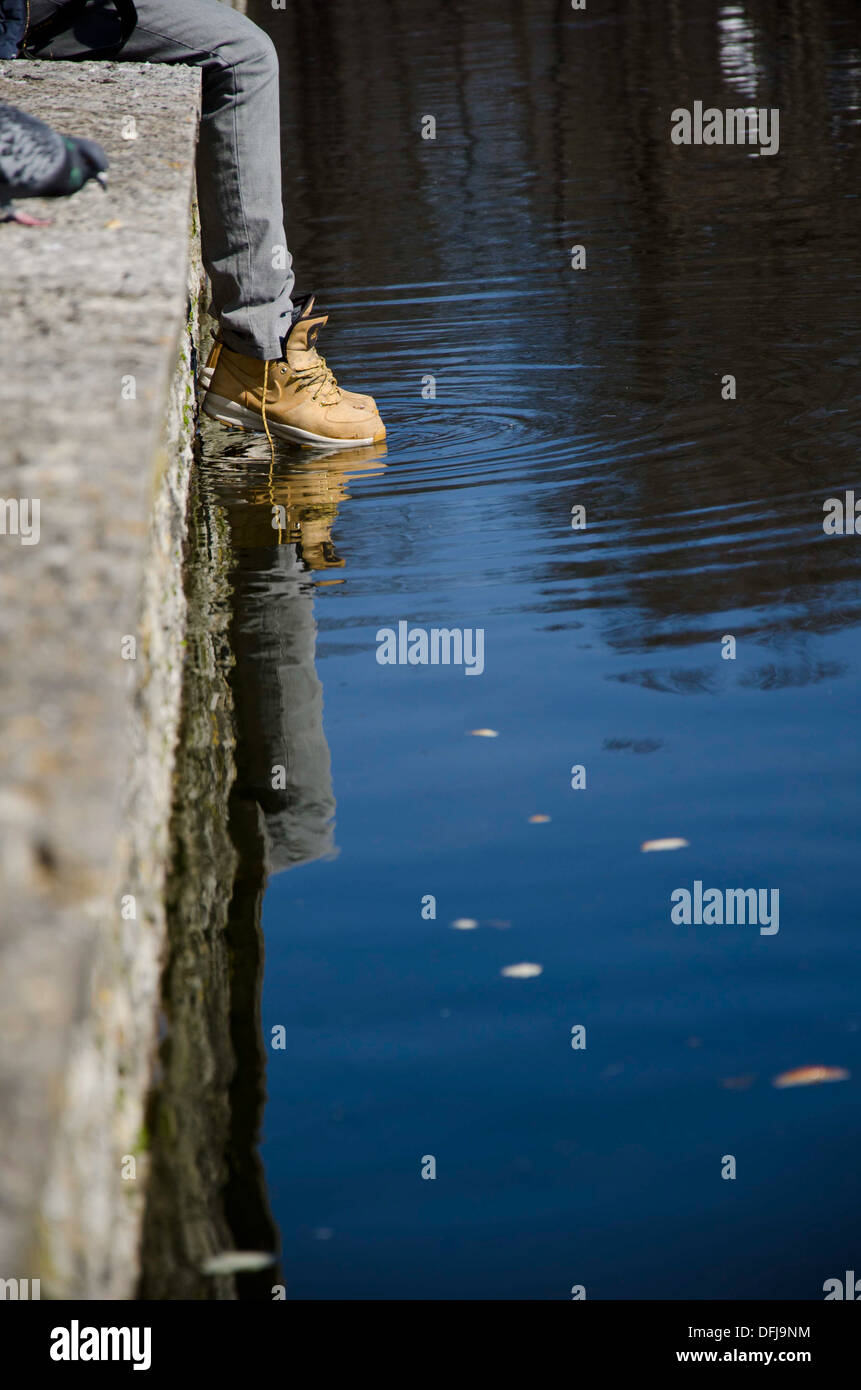 men relaxing by the water Stock Photo - Alamy