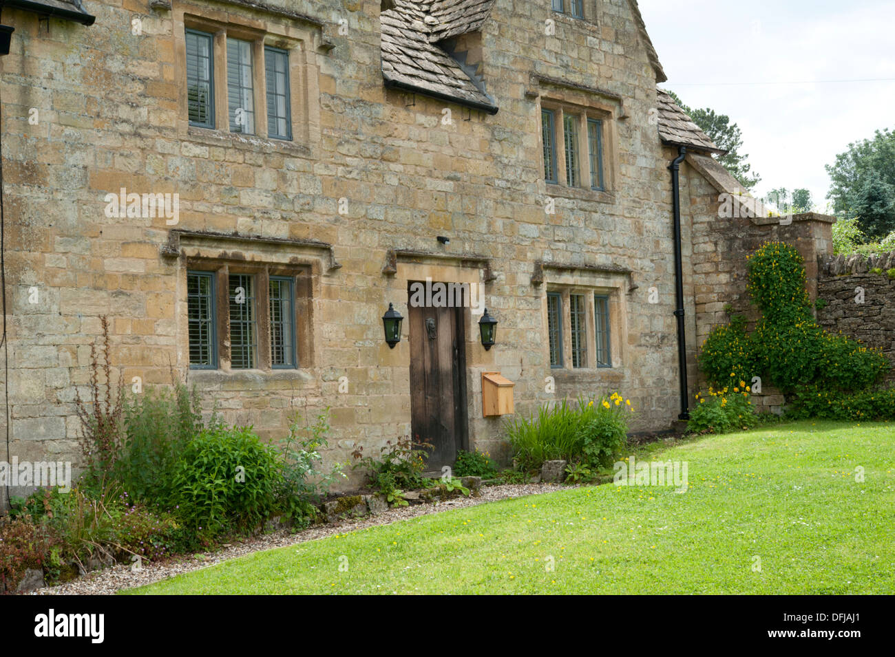 View of typical Cotswold stone buildings in the village of Guiting ...