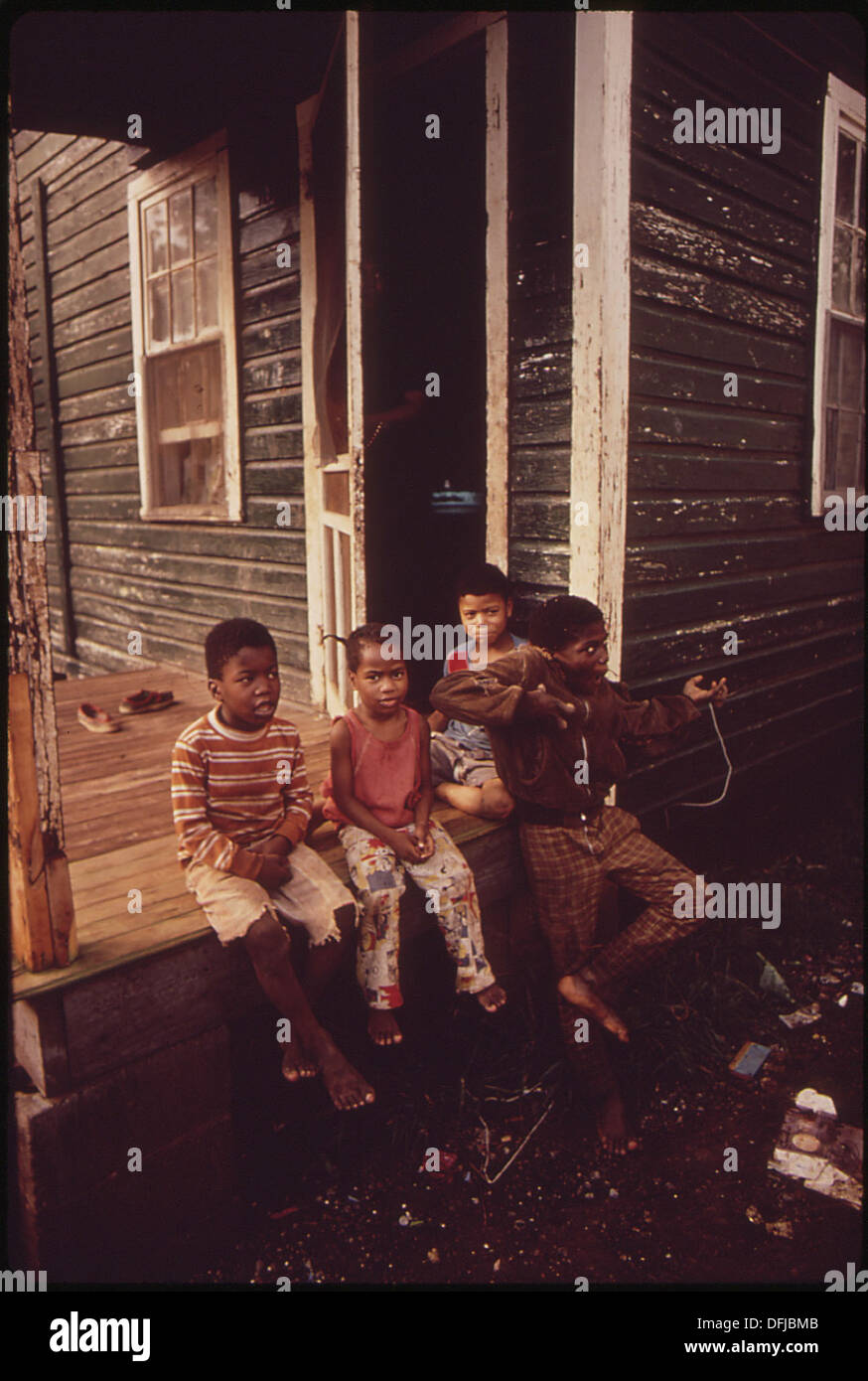 This photograph highlights the conditions of substandard housing in ...