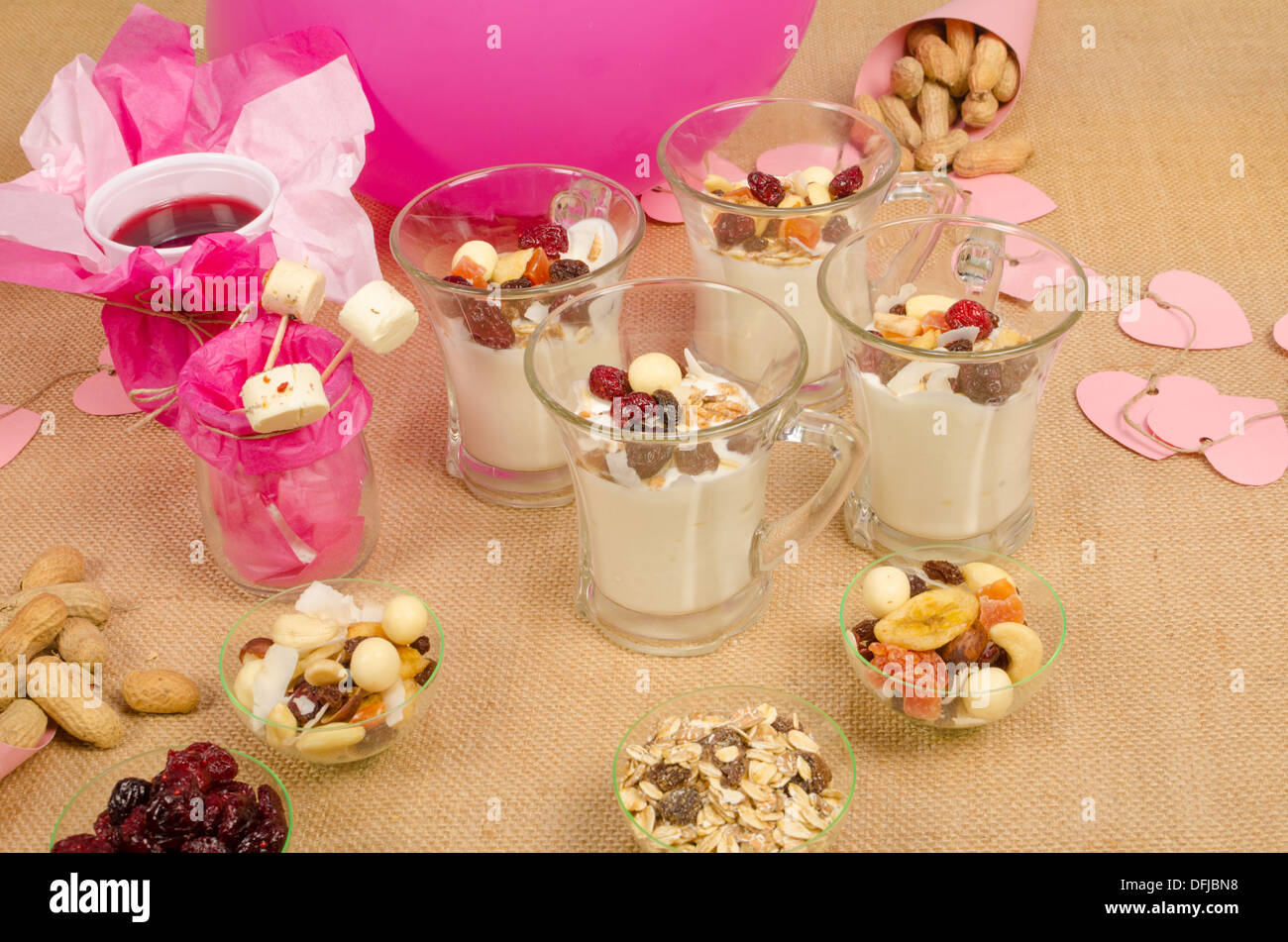 Table with an assortment of healthy party snacks Stock Photo - Alamy