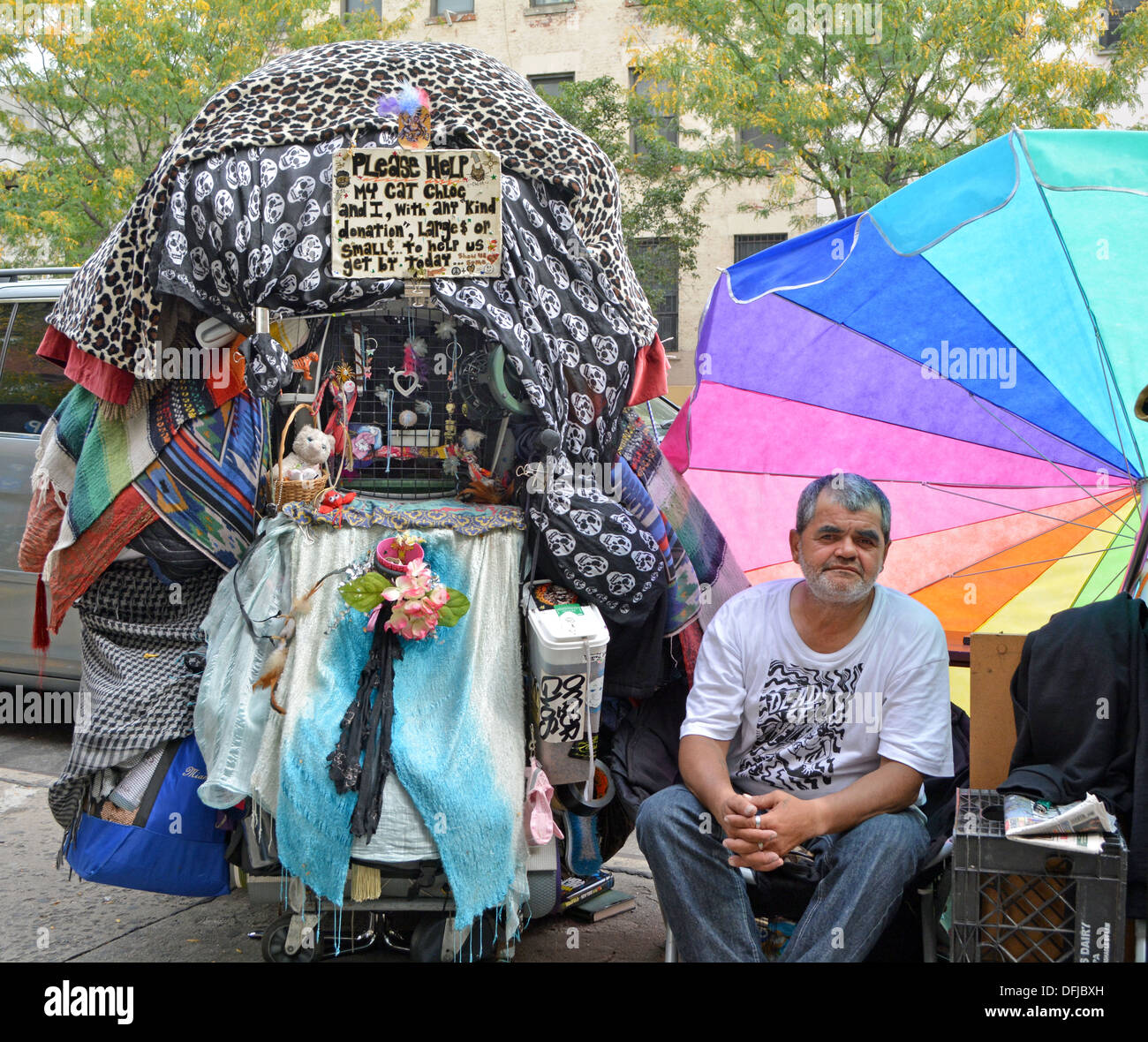 A panhandler with a novel display in the East Village of New York City ...