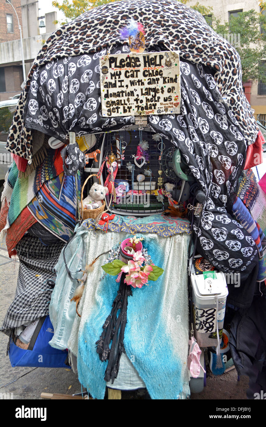 A panhandler with a novel display in the East Village of New York City ...