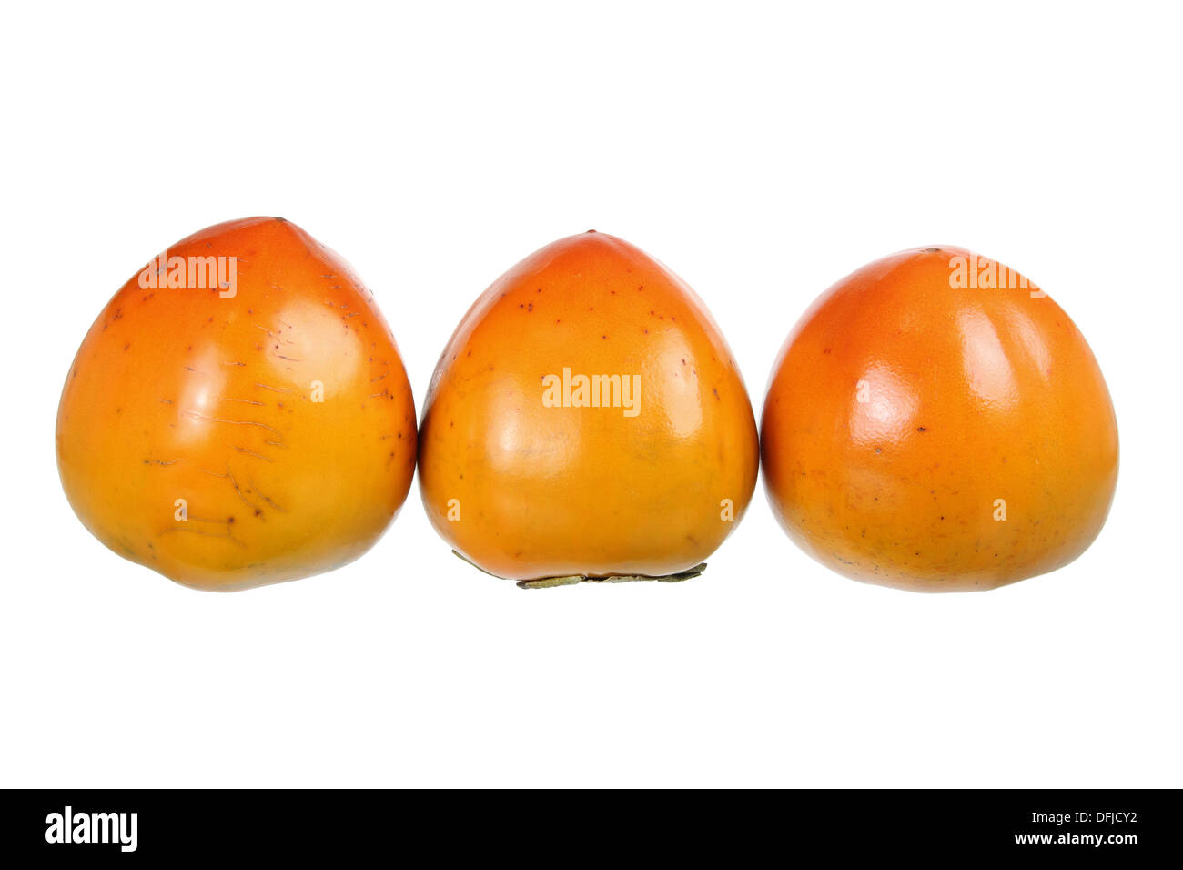 Whole cut fresh persimmons hi-res stock photography and images - Alamy
