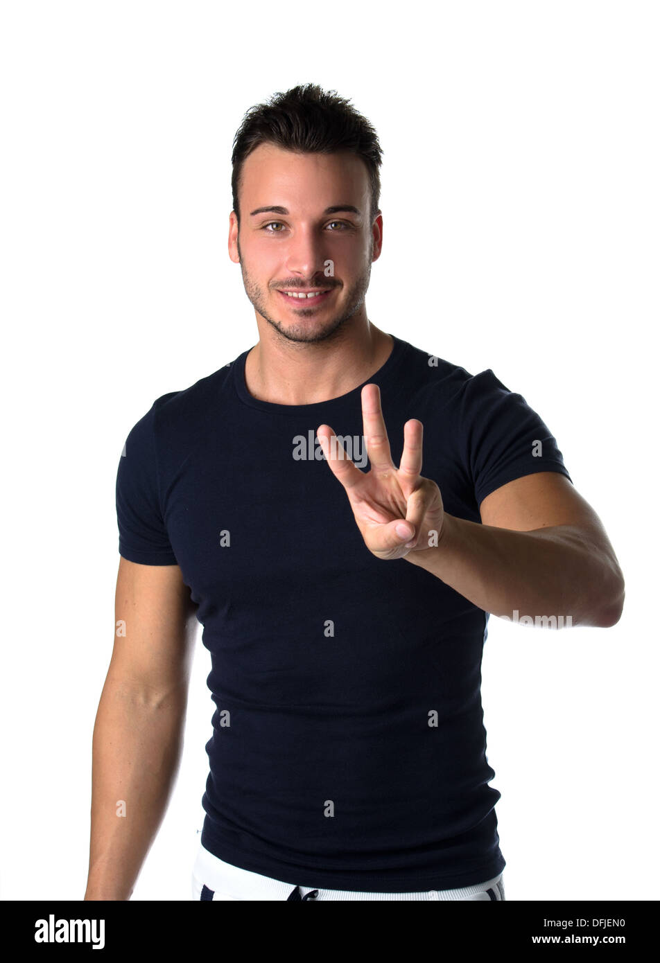 Attractive young man counting to three with fingers and hands, isolated ...