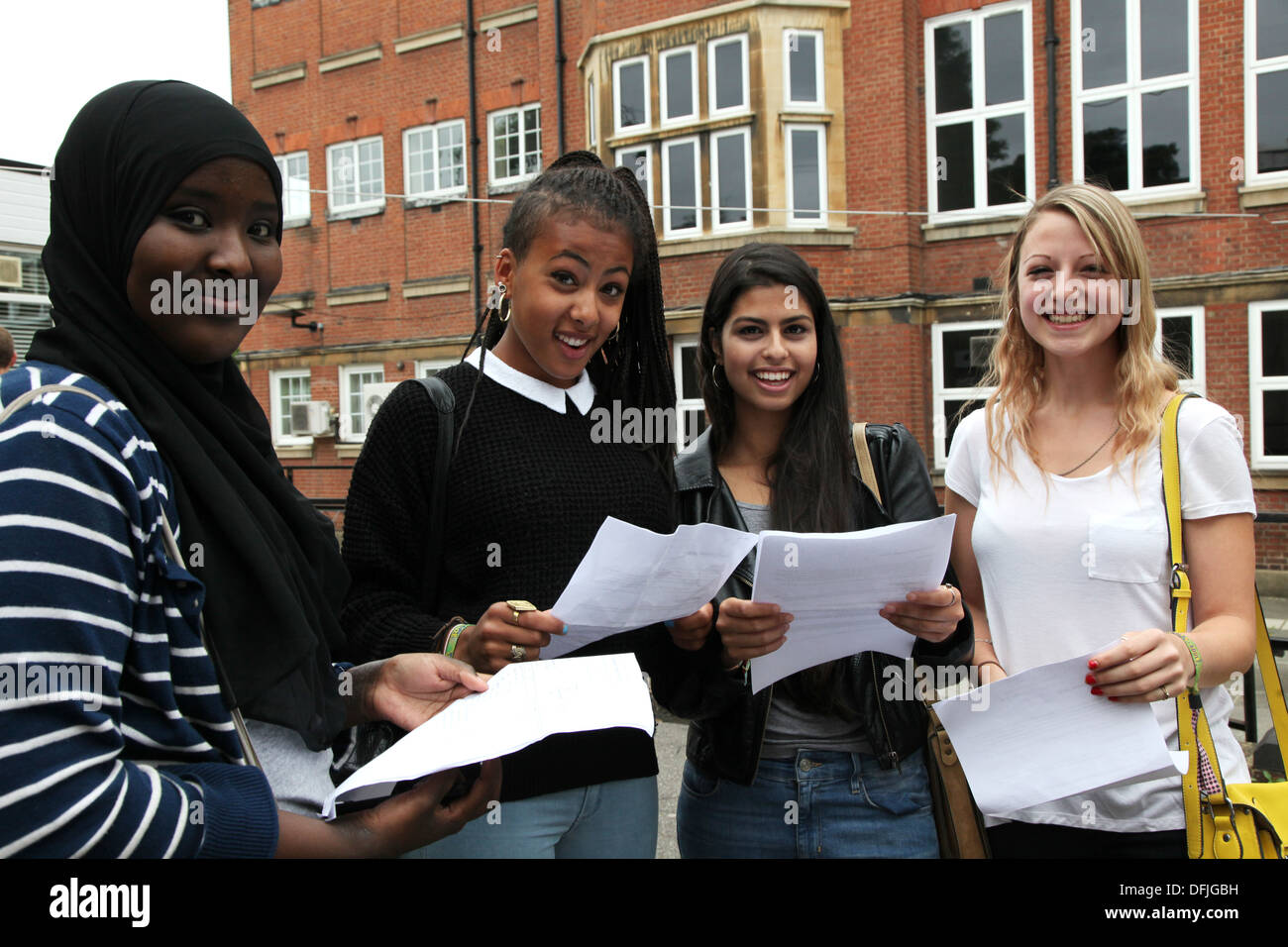 Girls with results from their AS-level exams, a qualification ranked ...