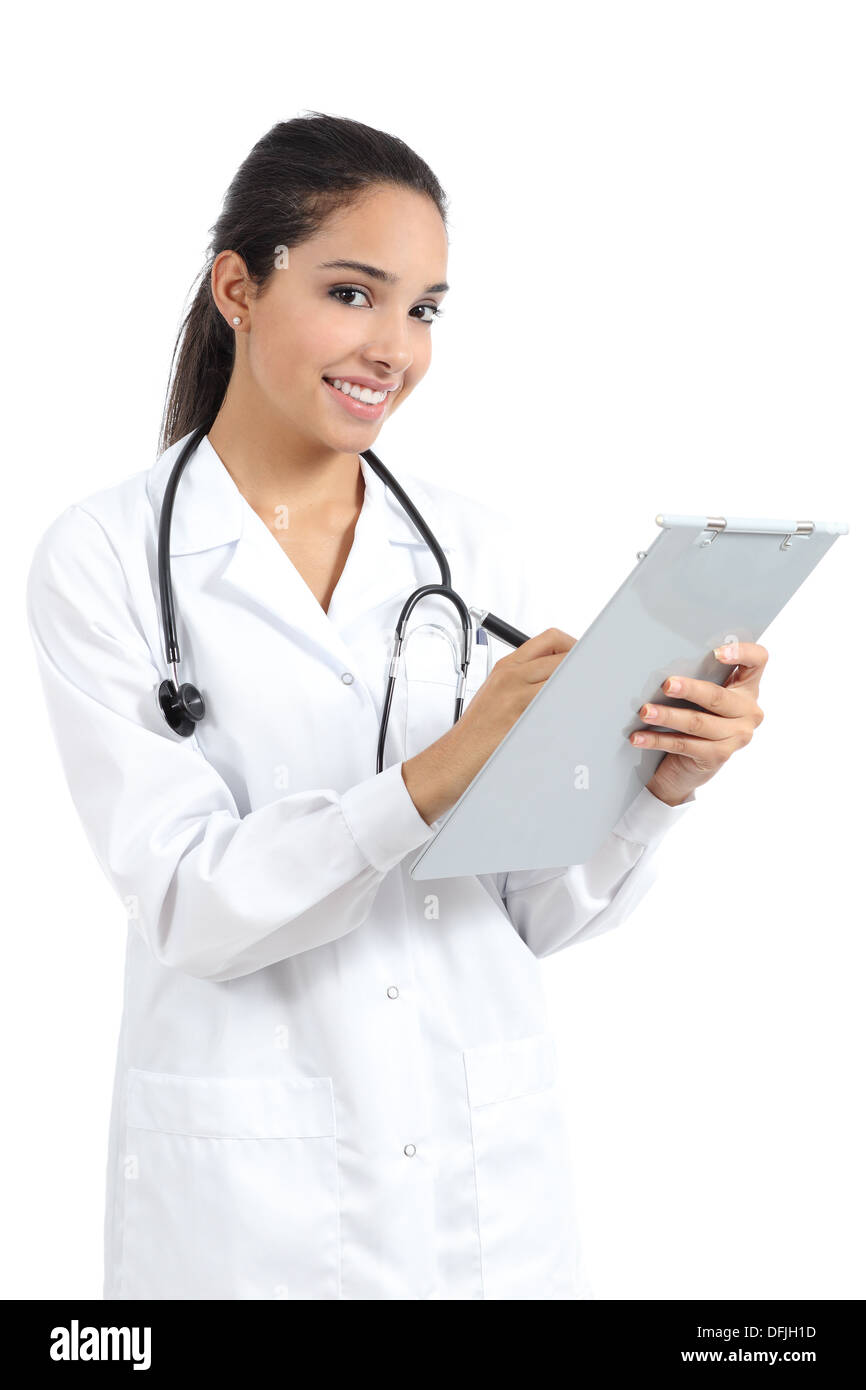 Beautiful arab female doctor writing a medical history isolated on a ...