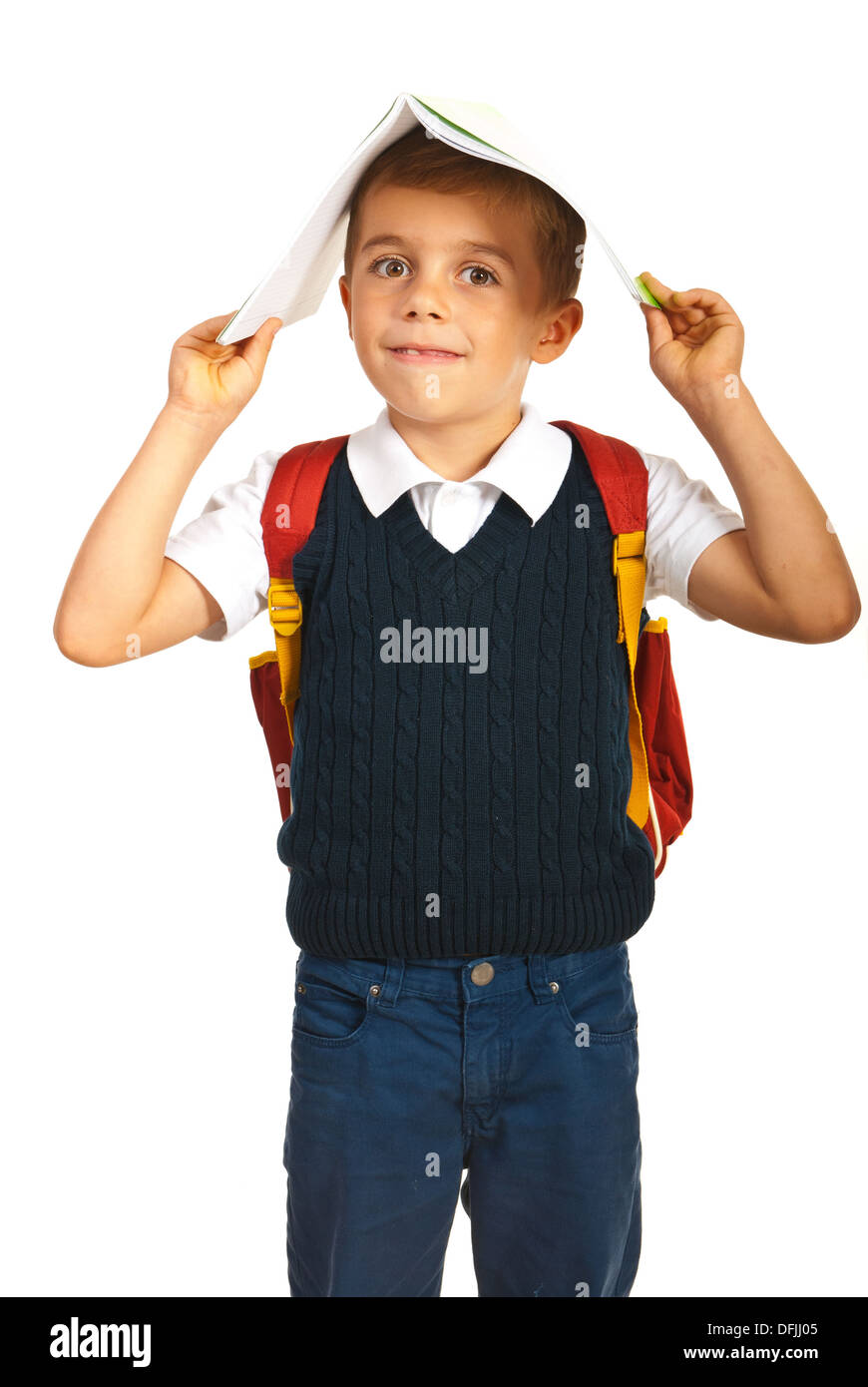 Amazed boy with notebook on his head isolated on white background Stock ...
